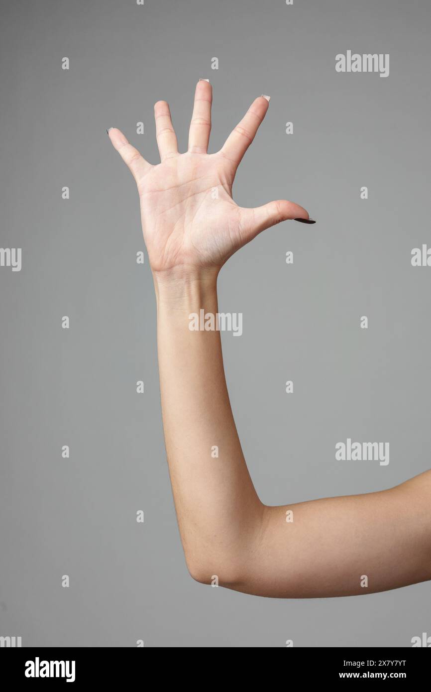 Human arm extended upward hi-res stock photography and images - Alamy