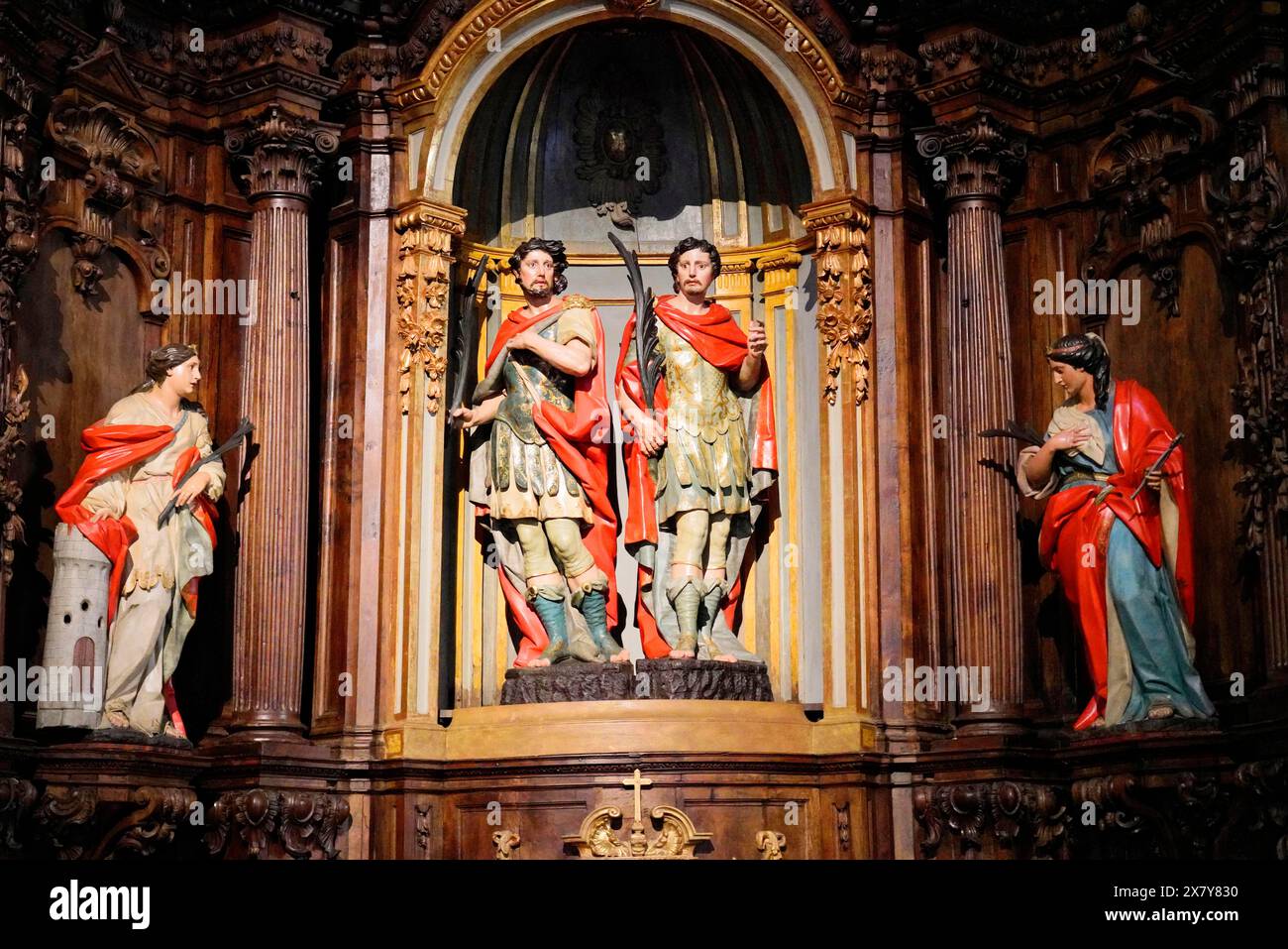 Iglesia San Nicolas de Bari, altar area of the church with two holy ...