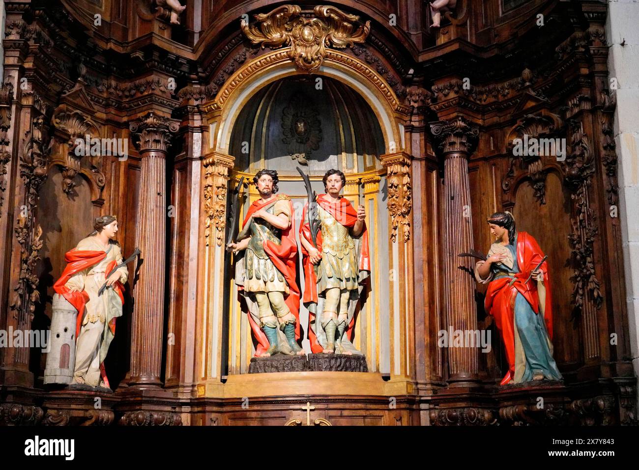 Iglesia San Nicolas de Bari, altar in a church with ornate wood ...