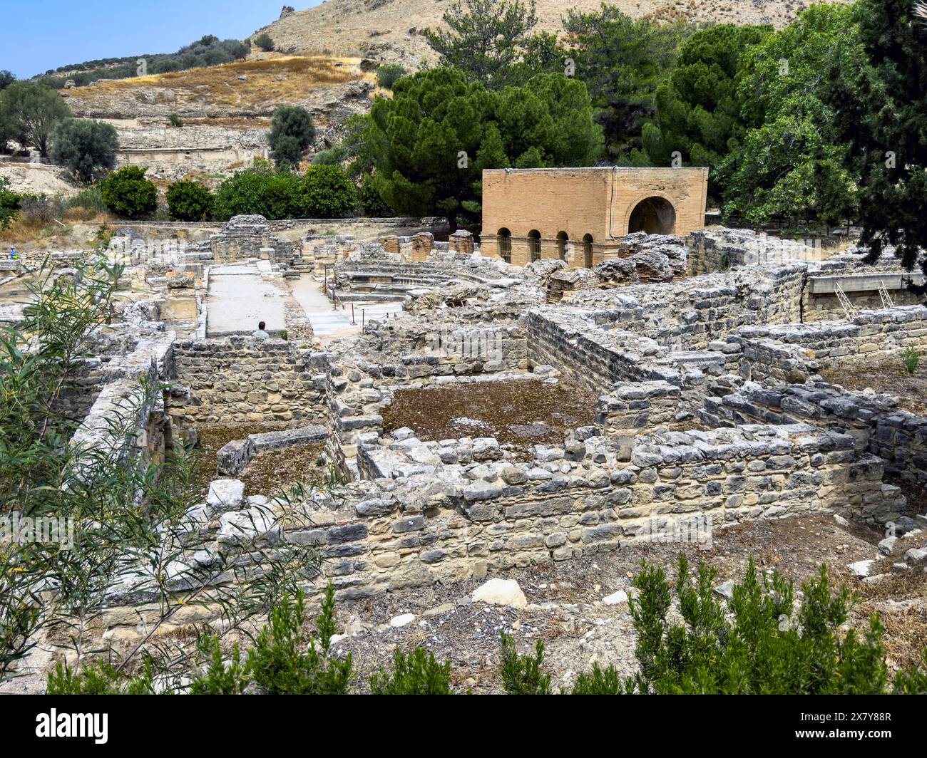 View of foundation walls behind ruins of historic Roman amphitheatre ...