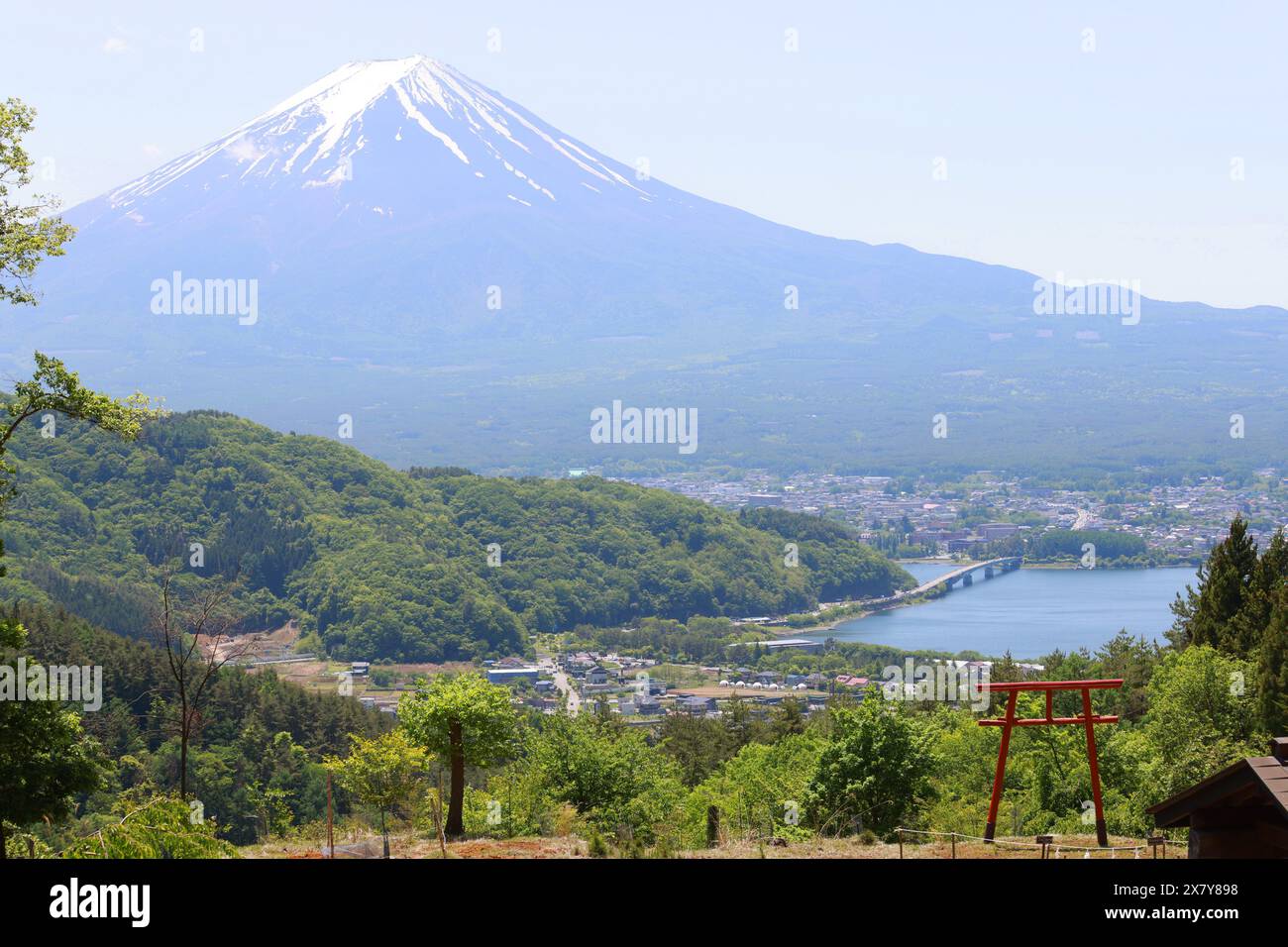 a traditional red Torri gate in front of the fuji mountain Stock Photo ...