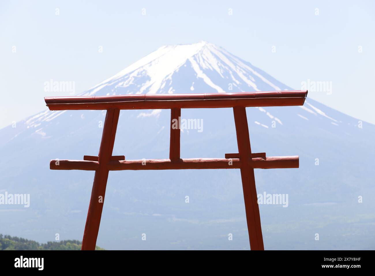 a traditional red Torri gate in front of the fuji mountain Stock Photo ...