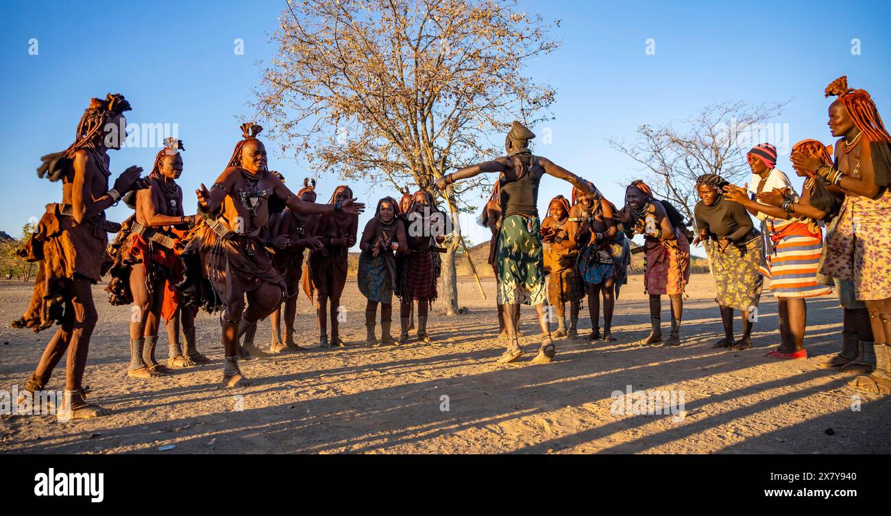 Group of traditional Himba woman with Cief of the village standing in a ...