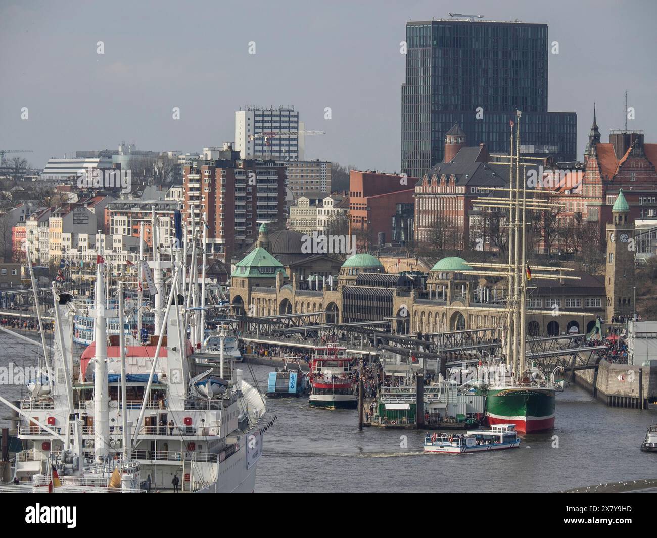 Harbour town with modern buildings, historical structures and various ...