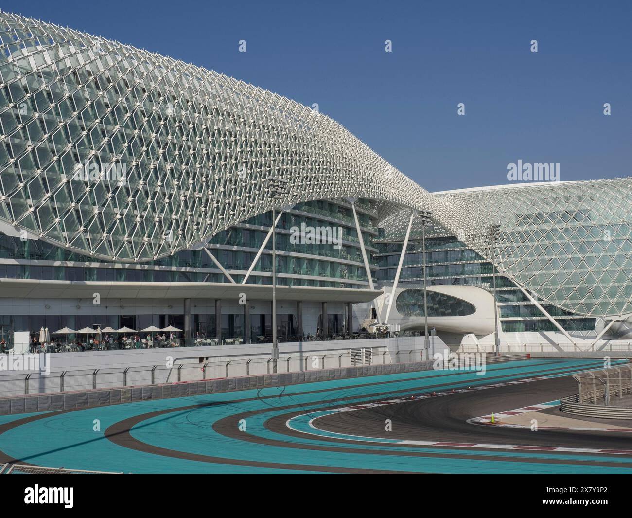 Modern building with striking grid structure and glass façade under a ...