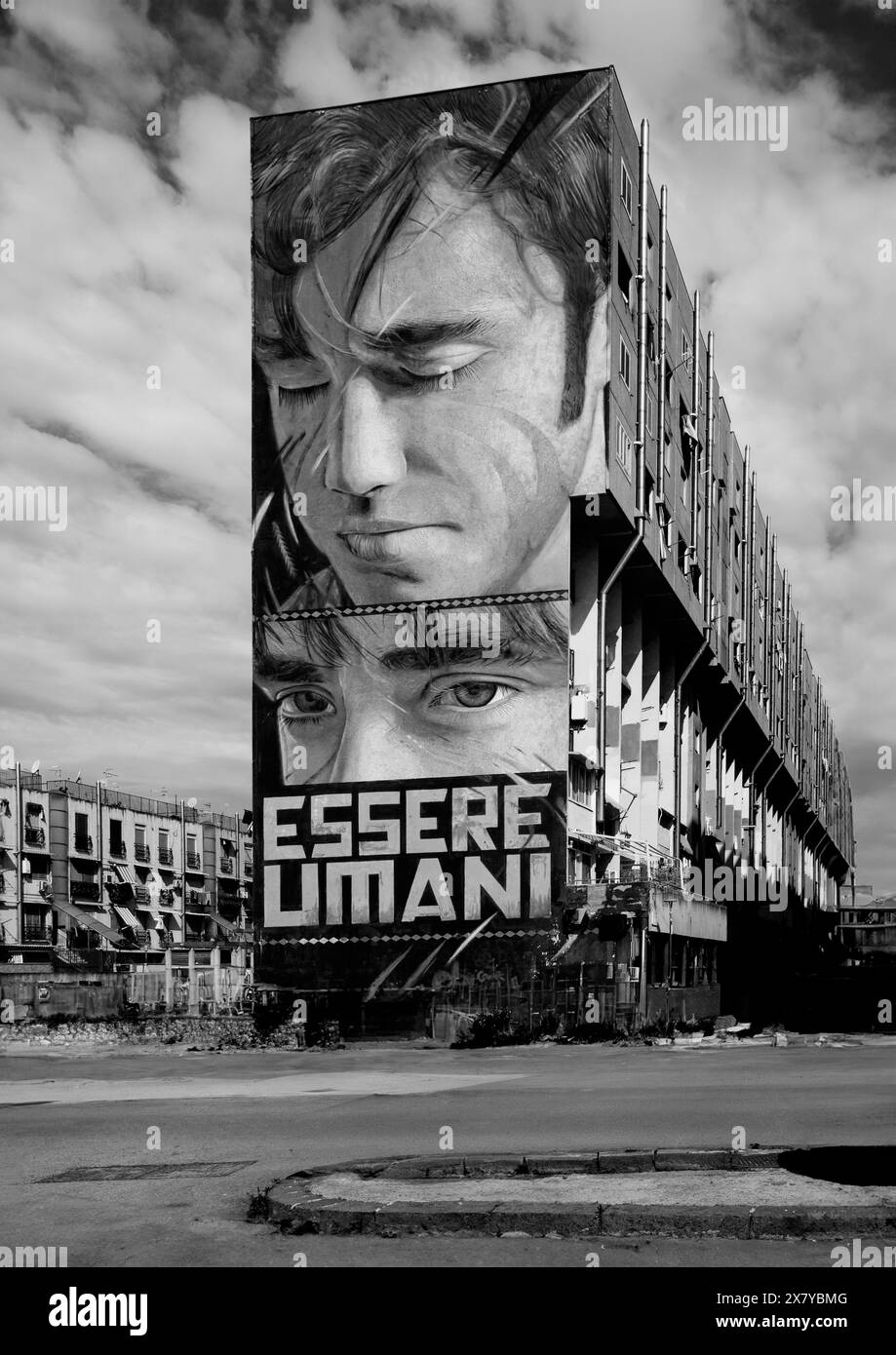 Street artist Jorit's mural of Maradona on a building in Naples, Italy ...