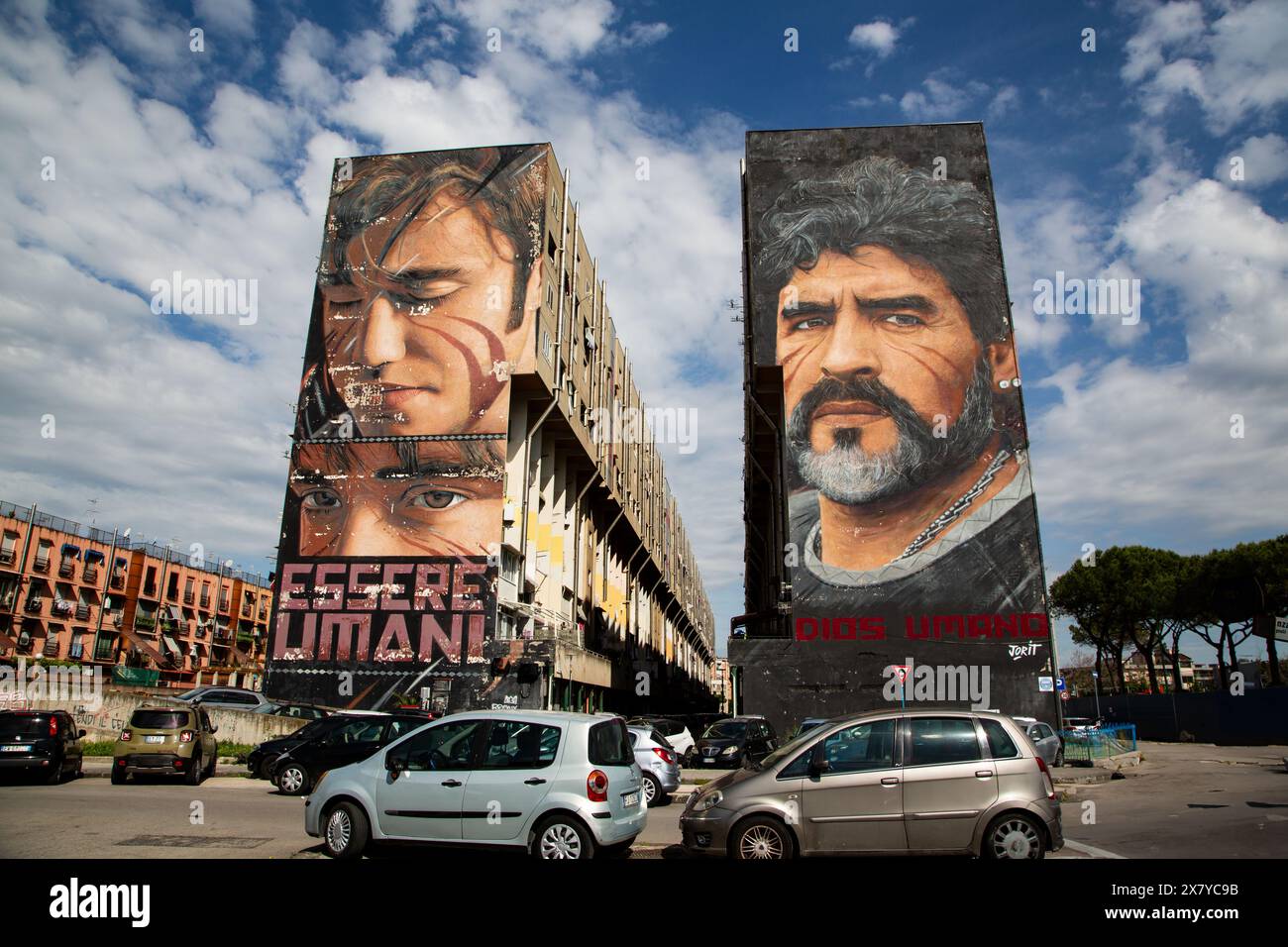 Street artist Jorit's mural of Maradona on a building in Naples, Italy ...