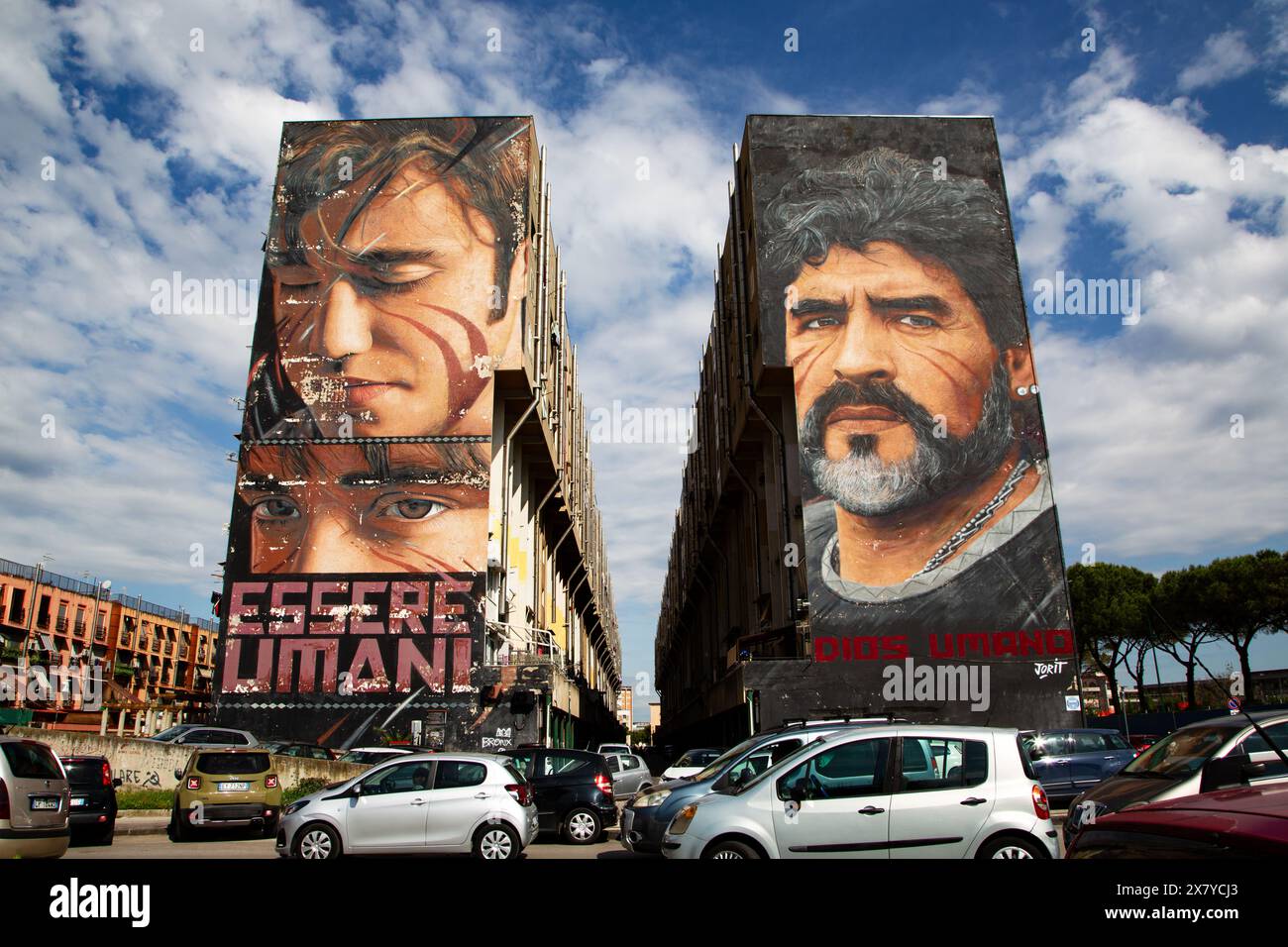 Street artist Jorit's mural of Maradona on a building in Naples, Italy ...