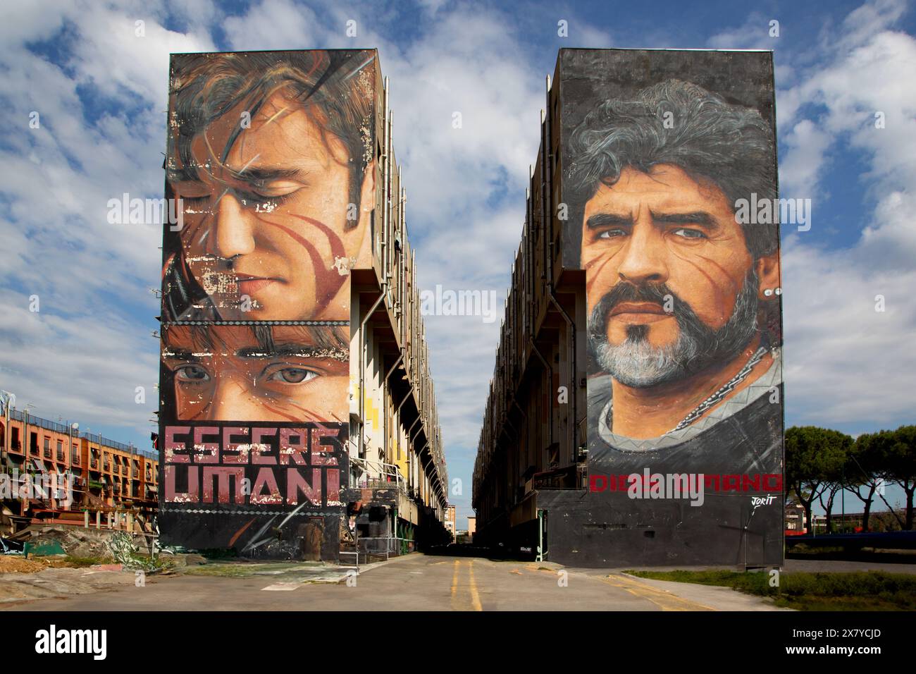 Street artist Jorit's mural of Maradona on a building in Naples, Italy ...