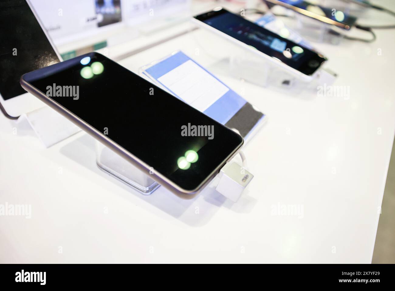 New mobile smartphone in telecommunication electronic store display ...