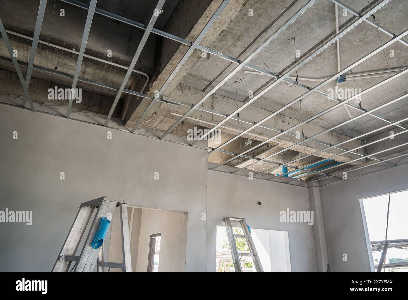 Install metal frame for plaster board ceiling at house under ...