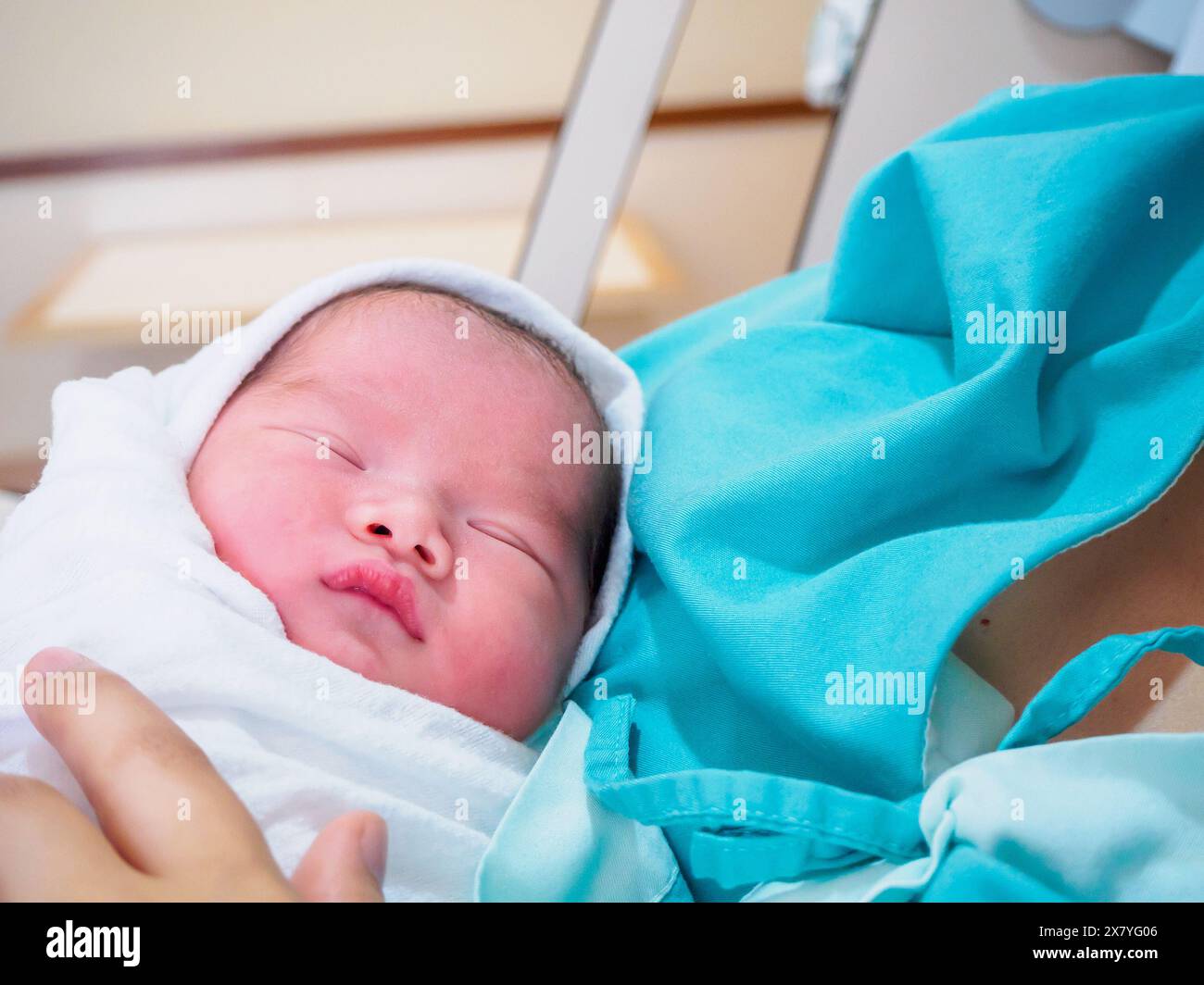 Happy Mother and Newborn Baby after labor at the hospital Stock Photo ...