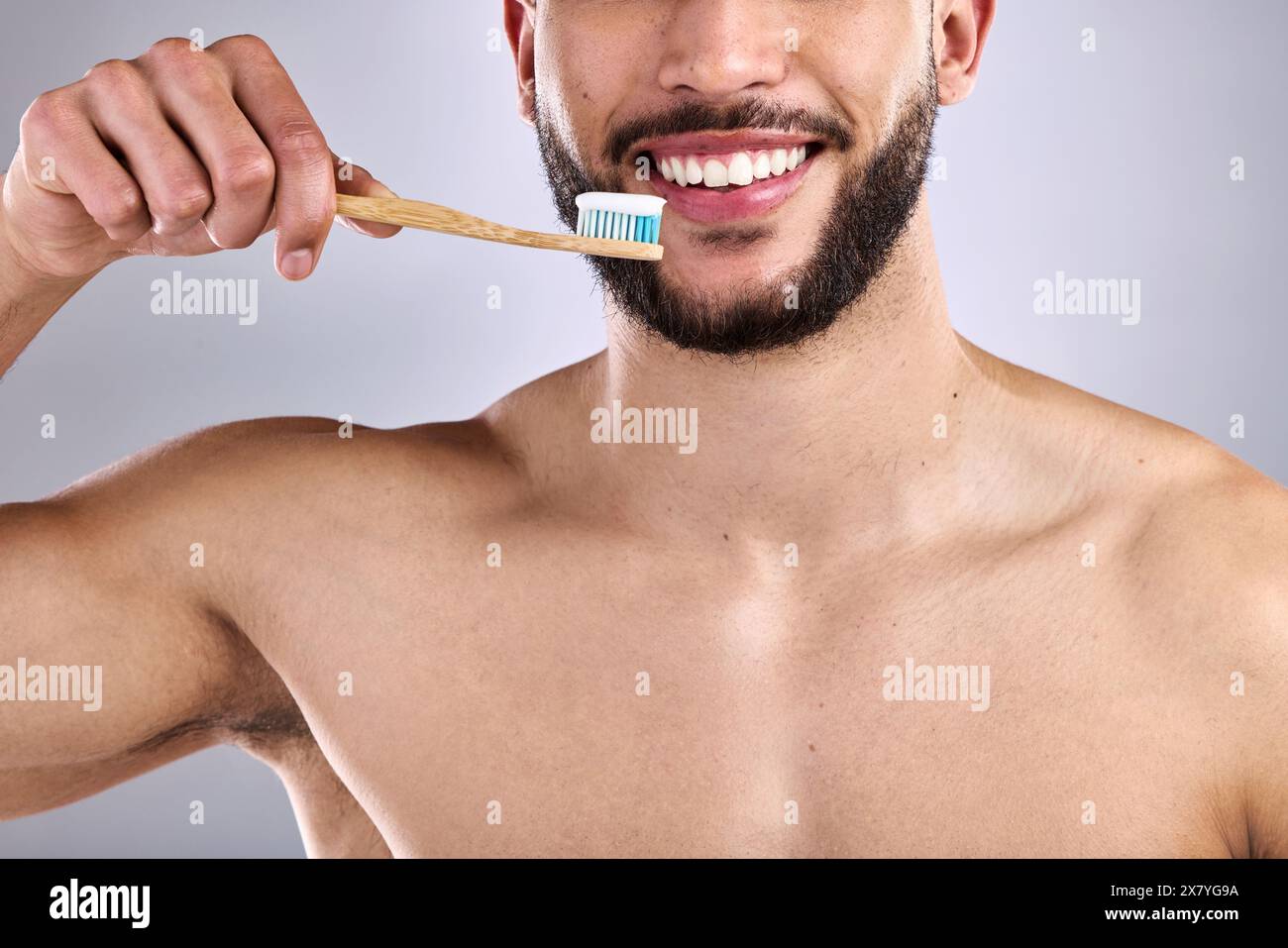 Toothpaste, man and brush in studio background with smile for oral ...