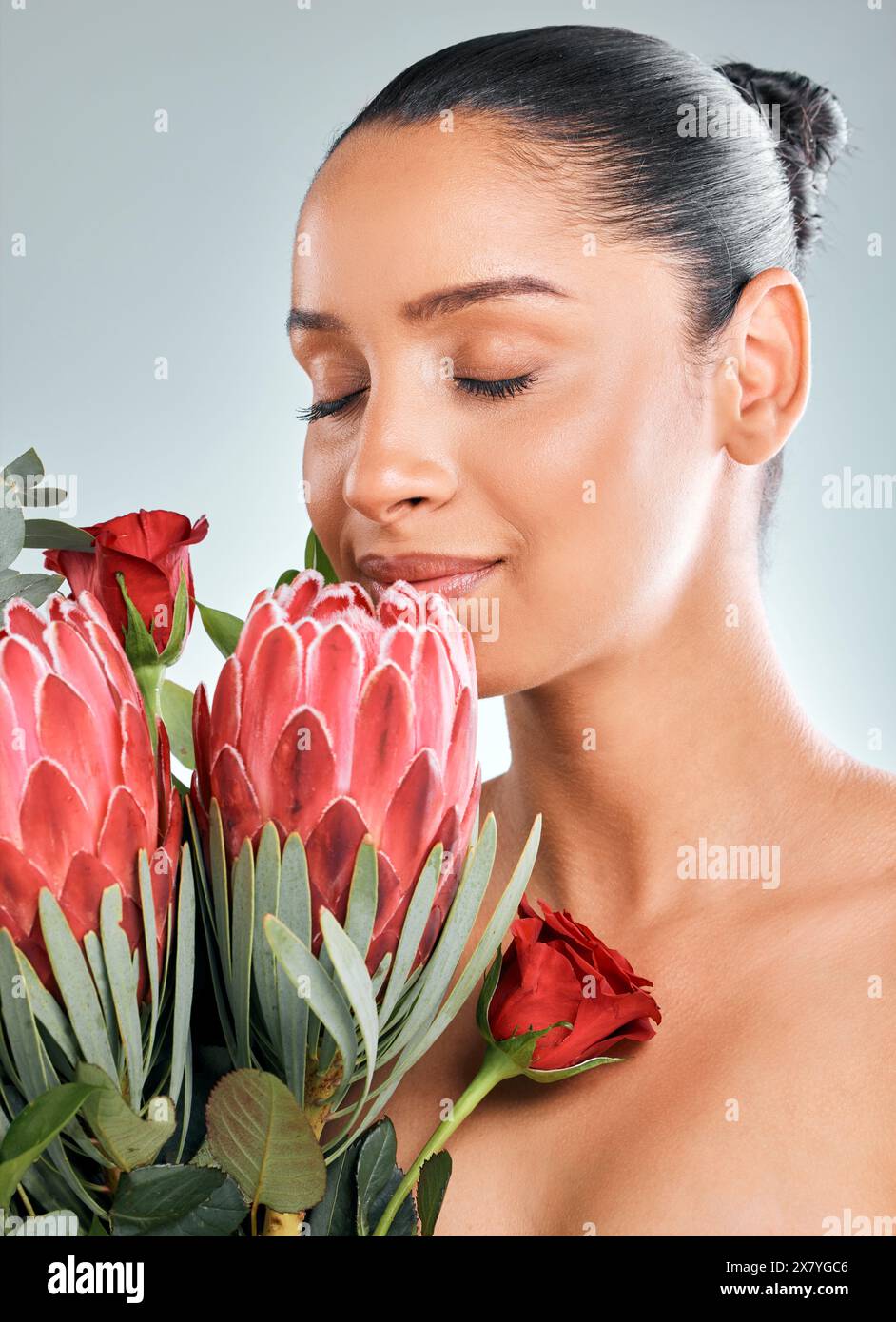 Smell, woman and skincare with plant in studio on white background for ...
