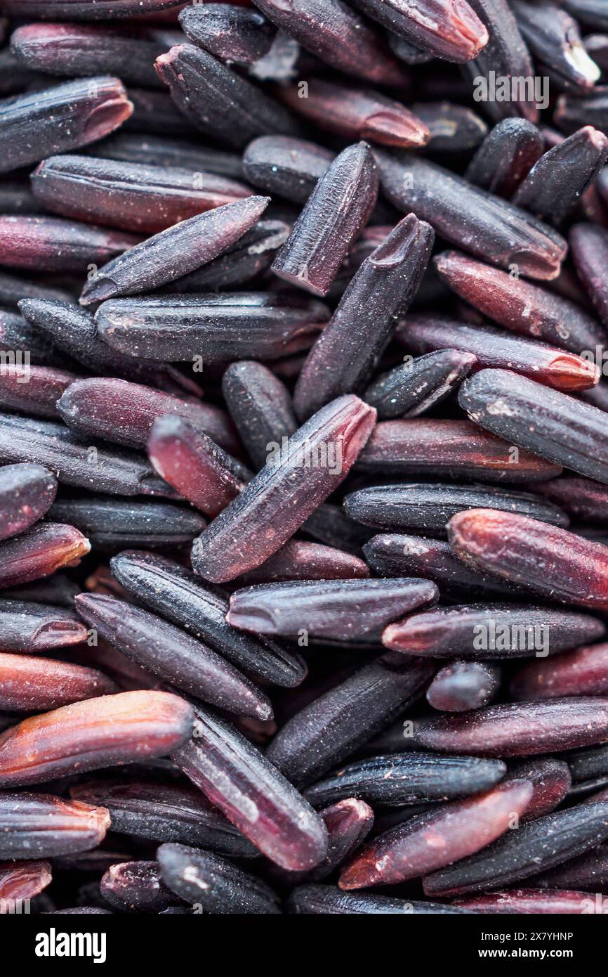 raw organic Thailand riceberry rice texture background Stock Photo - Alamy