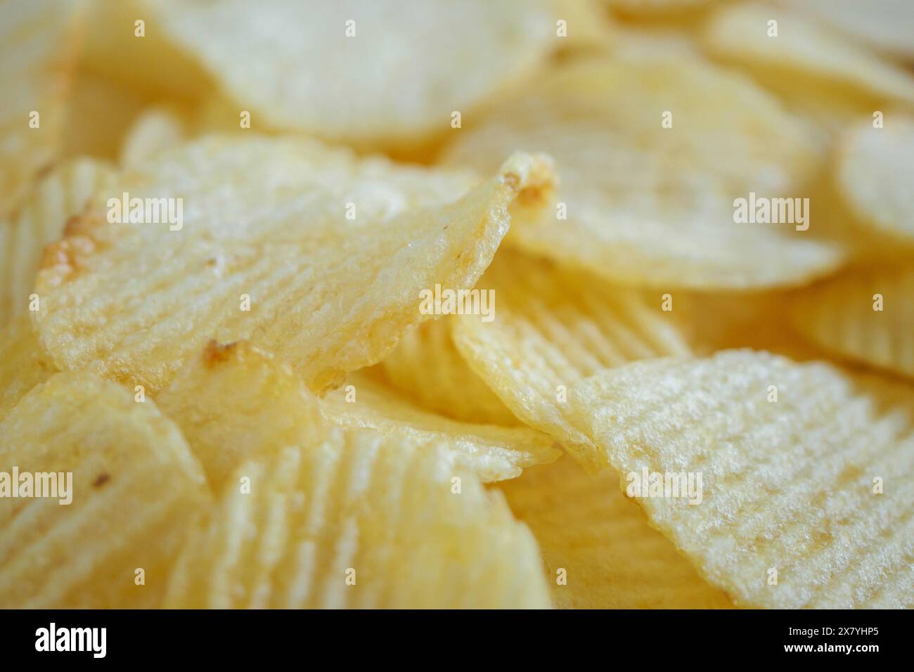 crispy potato chips snack texture background Stock Photo - Alamy