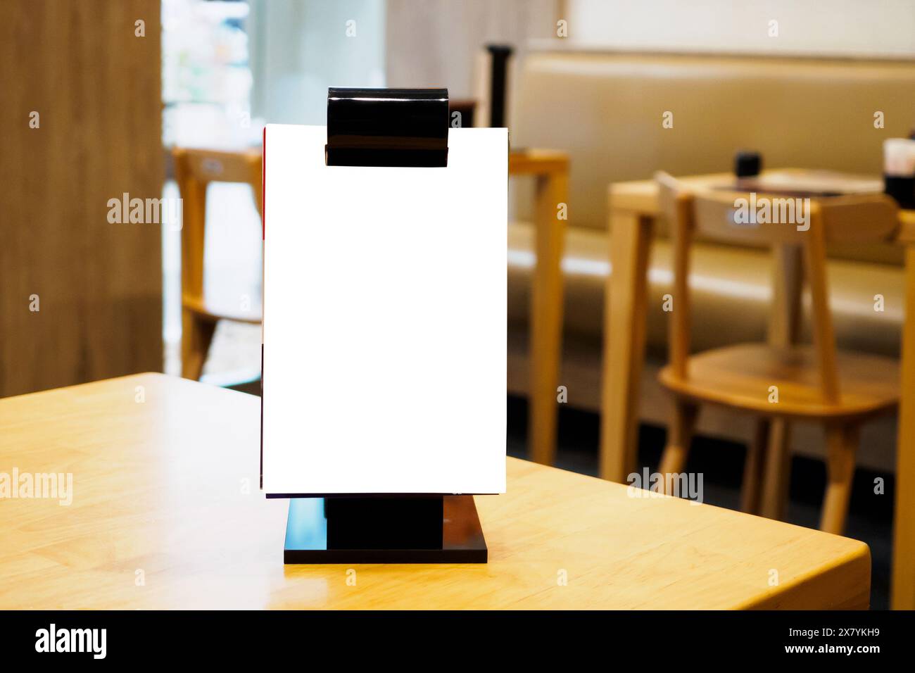 Mock up Blank white menu frame on cafe restaurant table Stock Photo - Alamy
