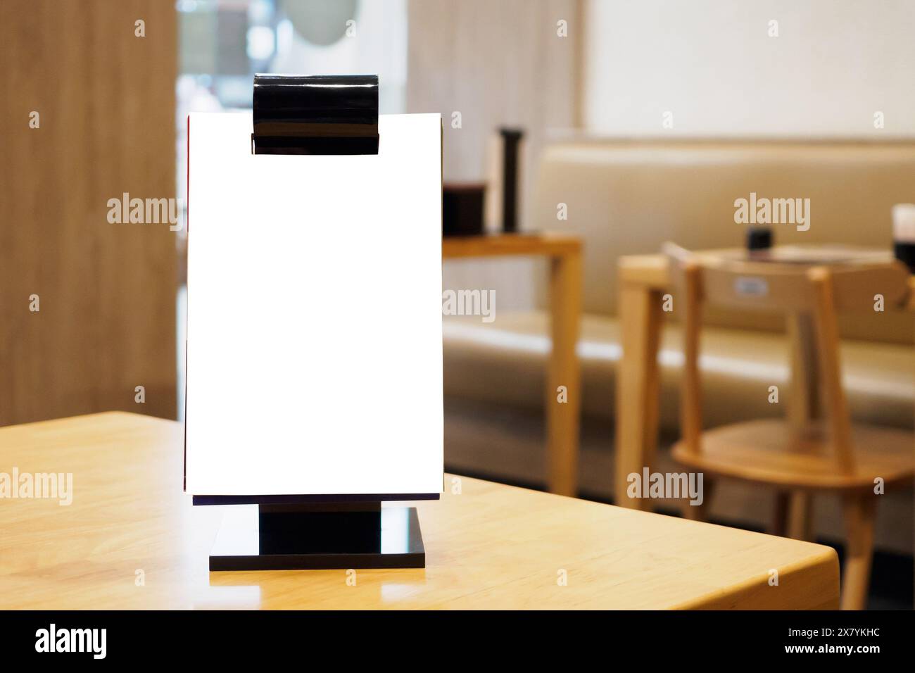 Mock up Blank white menu frame on cafe restaurant table Stock Photo - Alamy