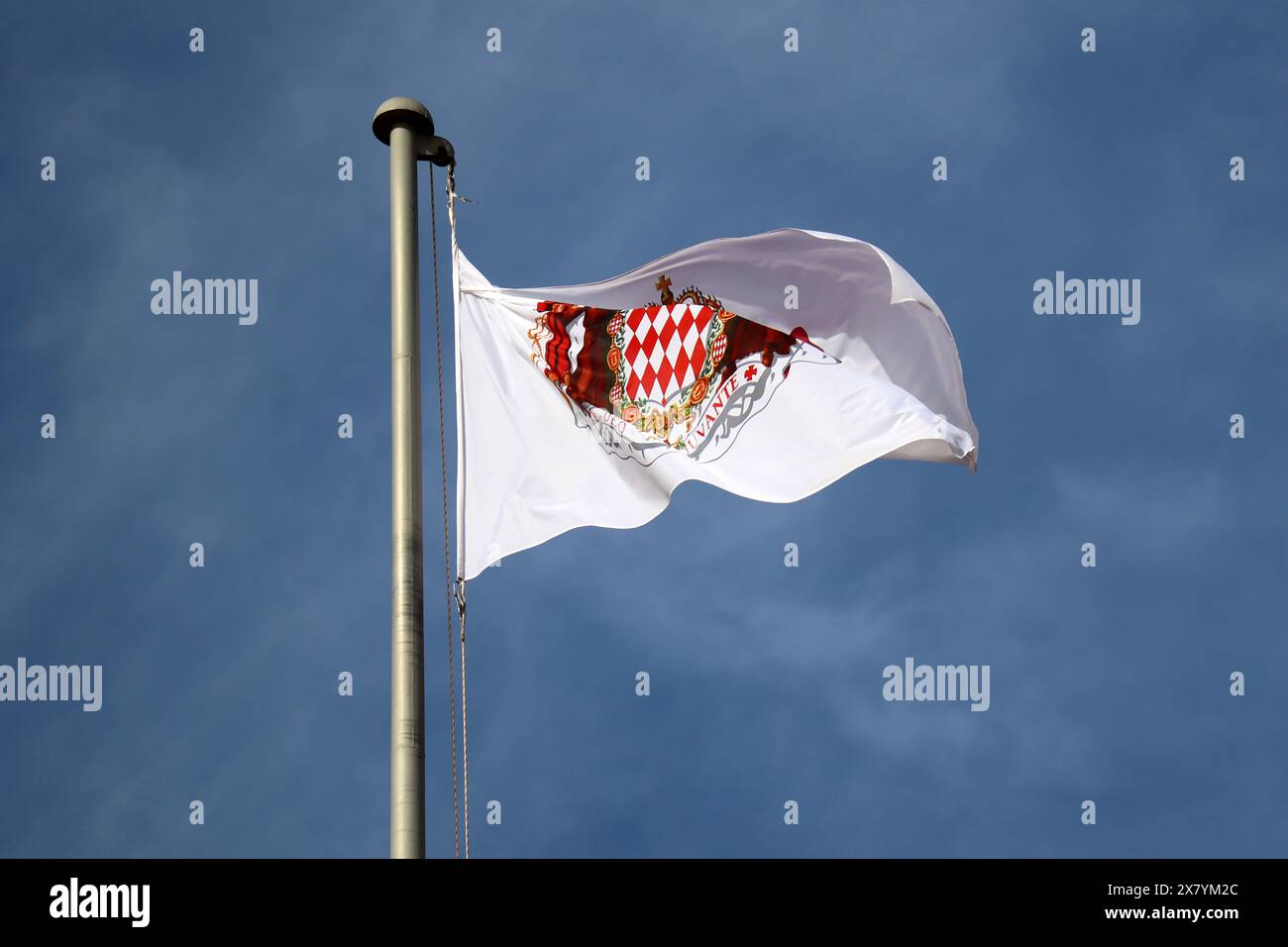 Flag of the Principality of Monaco over the Castle of Grimaldi Stock ...