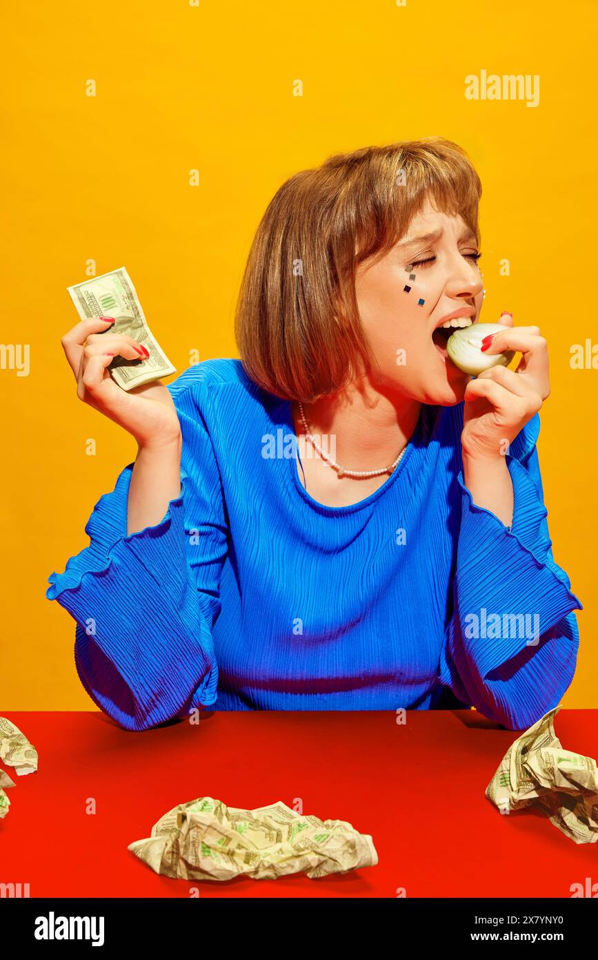 Portrait of young girl with makeup holding dollar money, crying and ...