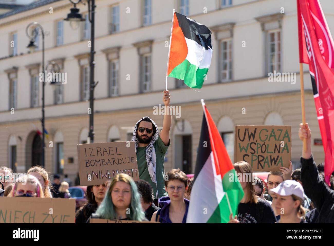 Warsaw, Poland. 17th May, 2024. A protester waves a Palestinian flag ...