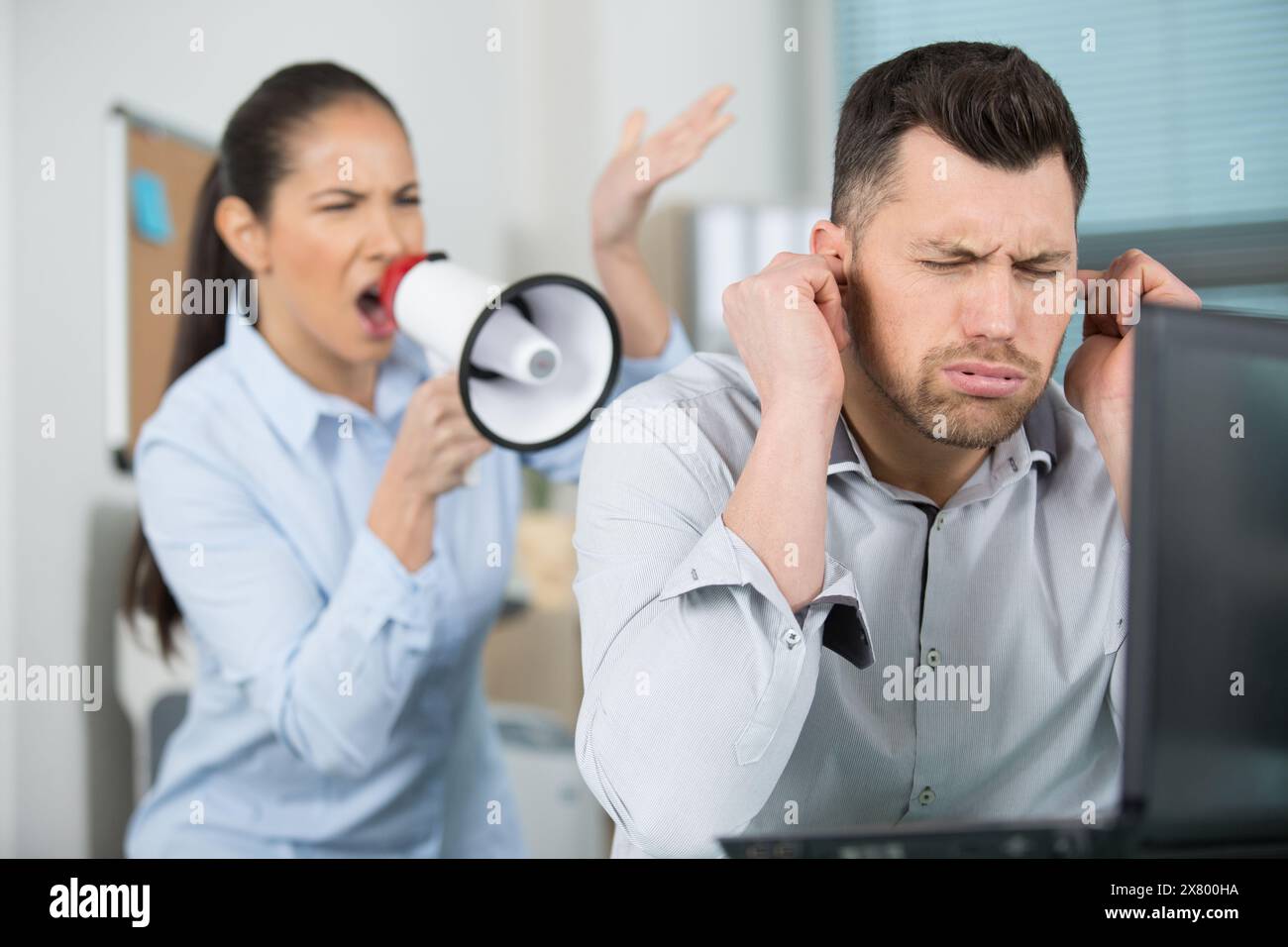 angry woman boss yelling at her male employee Stock Photo - Alamy