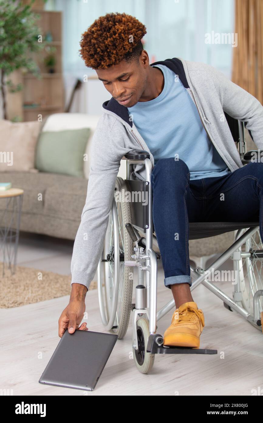 Man picking up from floor hi-res stock photography and images - Alamy