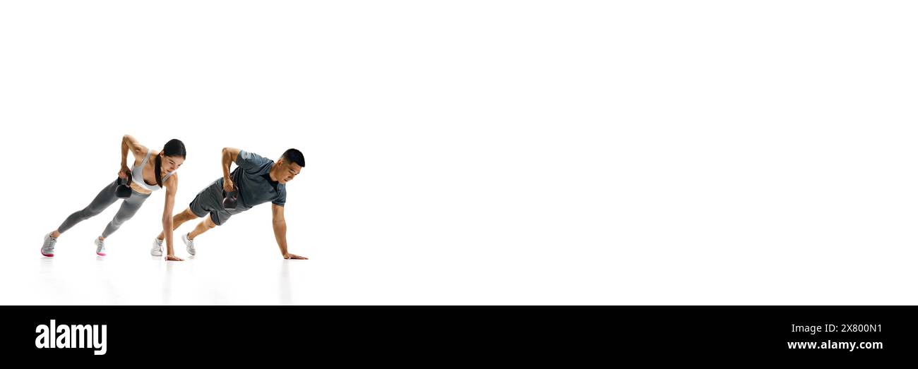 Banner. Man and woman in mid-exercise, performing plank row with ...