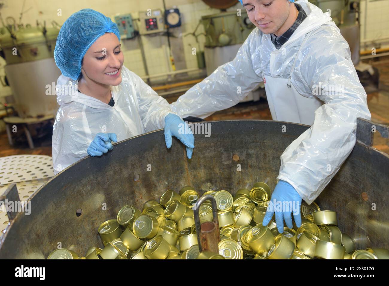 workers in the canning factory Stock Photo - Alamy