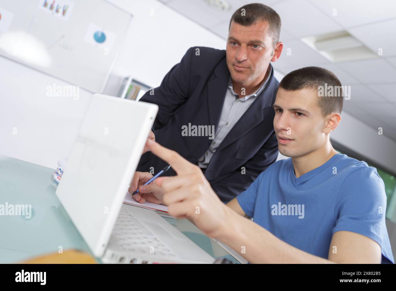 portrait of students laptop project Stock Photo - Alamy