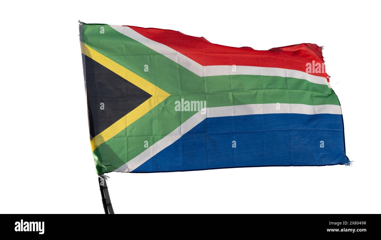 A small South African flag flutters in the wind with a clean background ...
