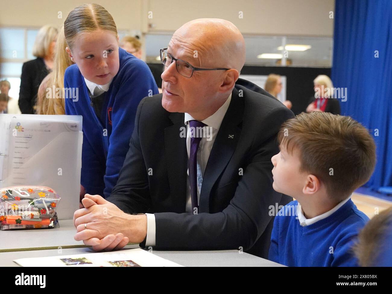 First Minister John Swinney chats to pupils during a visit to a ...