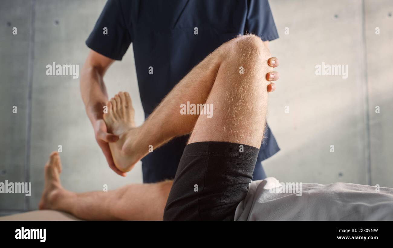 Close Up of a Young Male Athlete Undergoing Physiotherapy, Professional ...