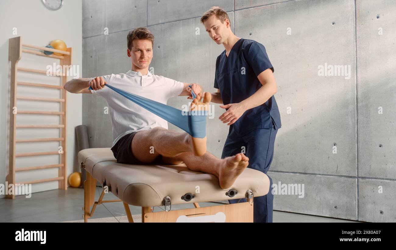 Young Male Athlete Undergoing Physiotherapy, Professional Sport Masseur ...
