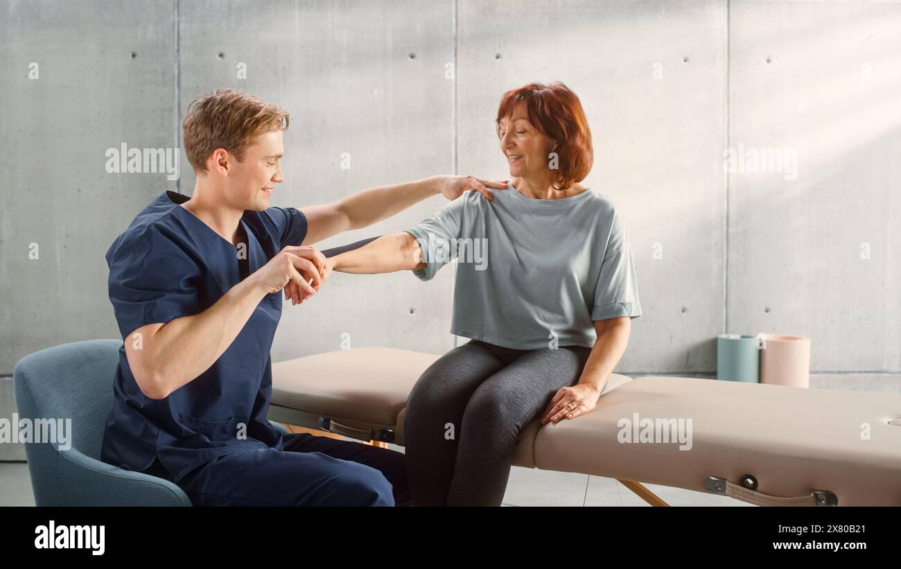 Professional Sport Physiotherapy Specialist Stretching and Working on ...