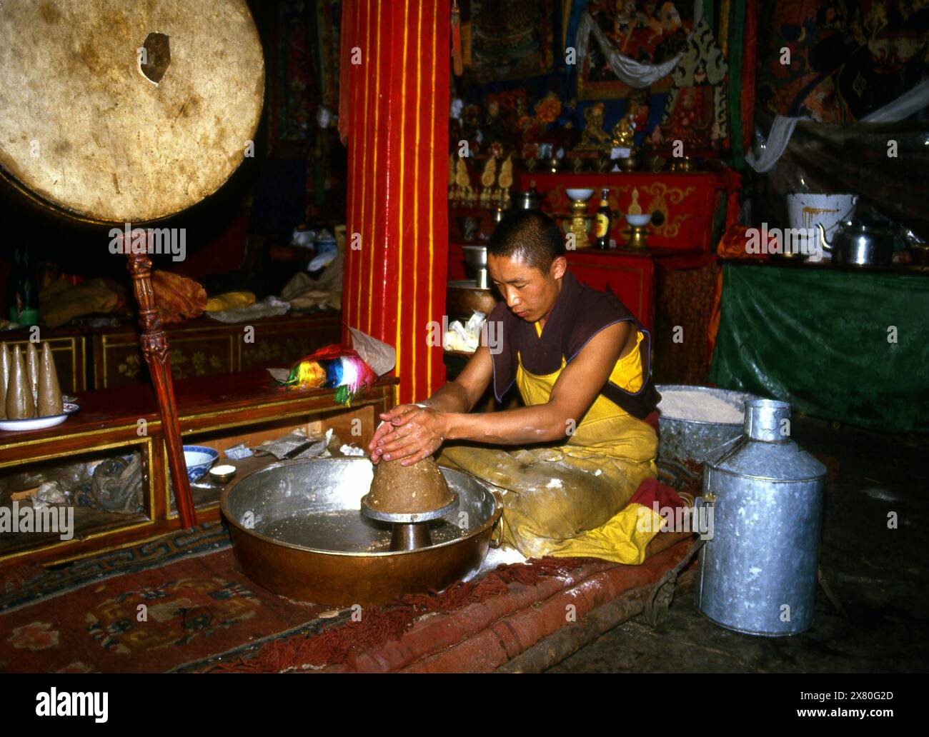 Making gifts with tsampa and yak butter Stock Photo - Alamy