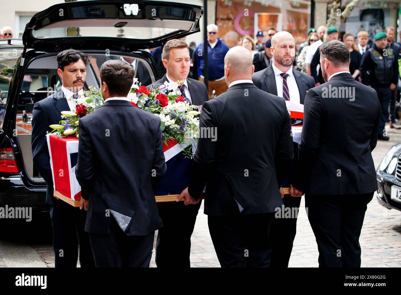The coffin of aid worker James Henderson, who was among seven World ...