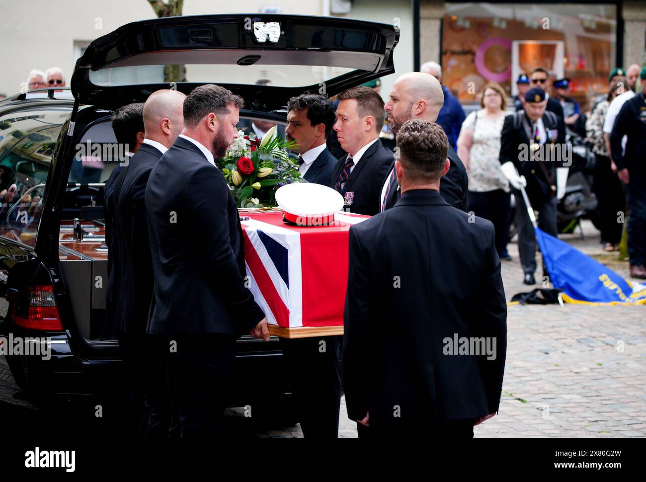 The coffin of aid worker James Henderson, who was among seven World ...