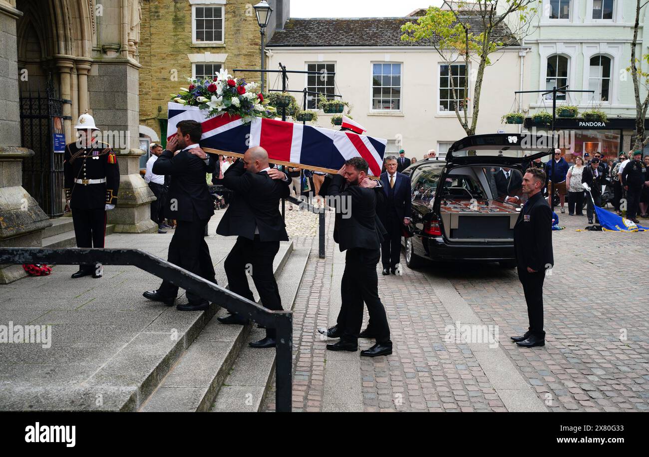 The coffin of aid worker James Henderson, who was among seven World ...