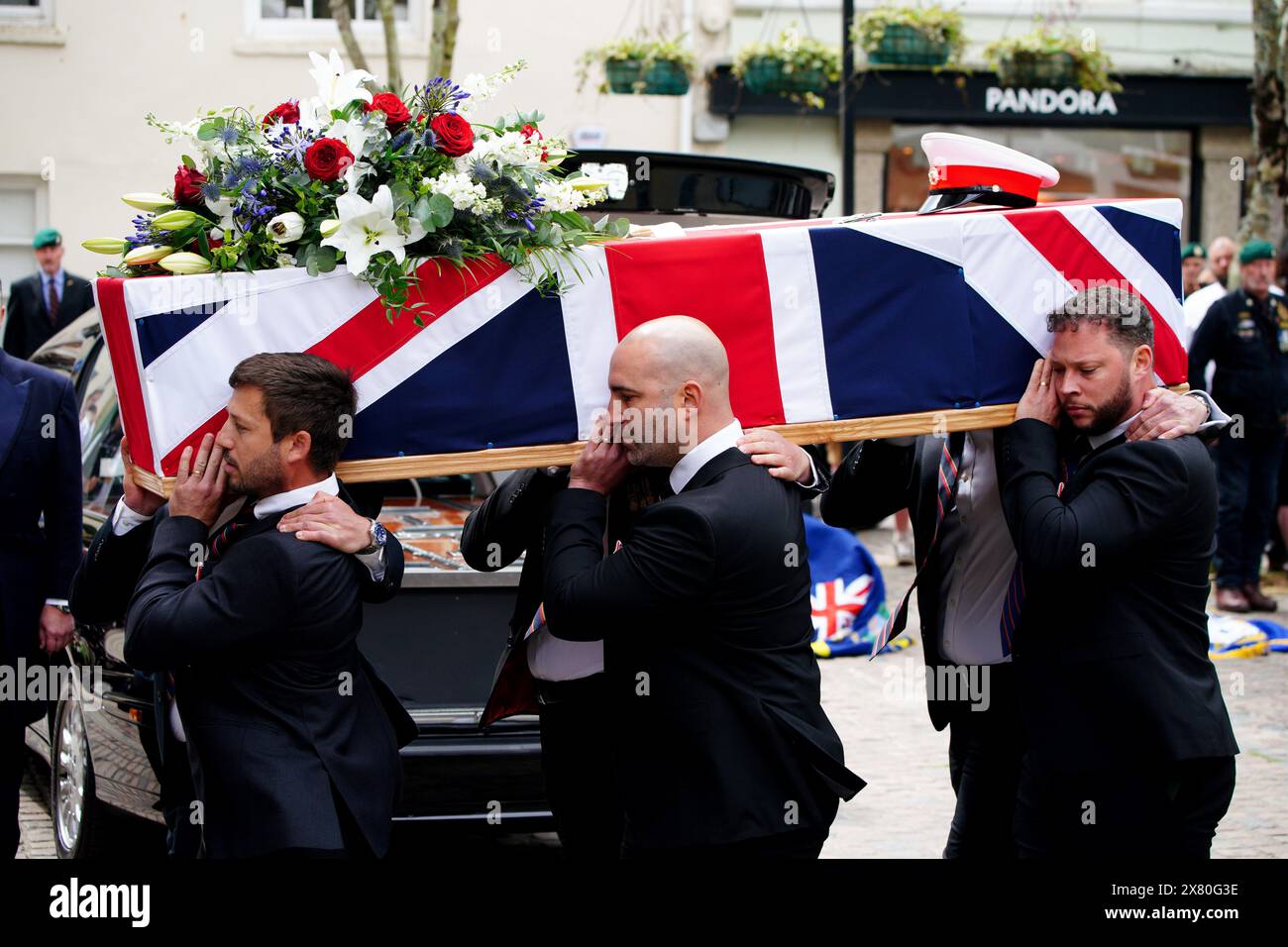 The coffin of aid worker James Henderson, who was among seven World ...