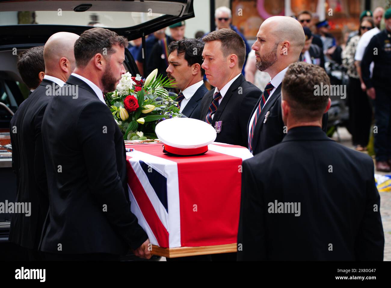 The coffin of aid worker James Henderson, who was among seven World ...
