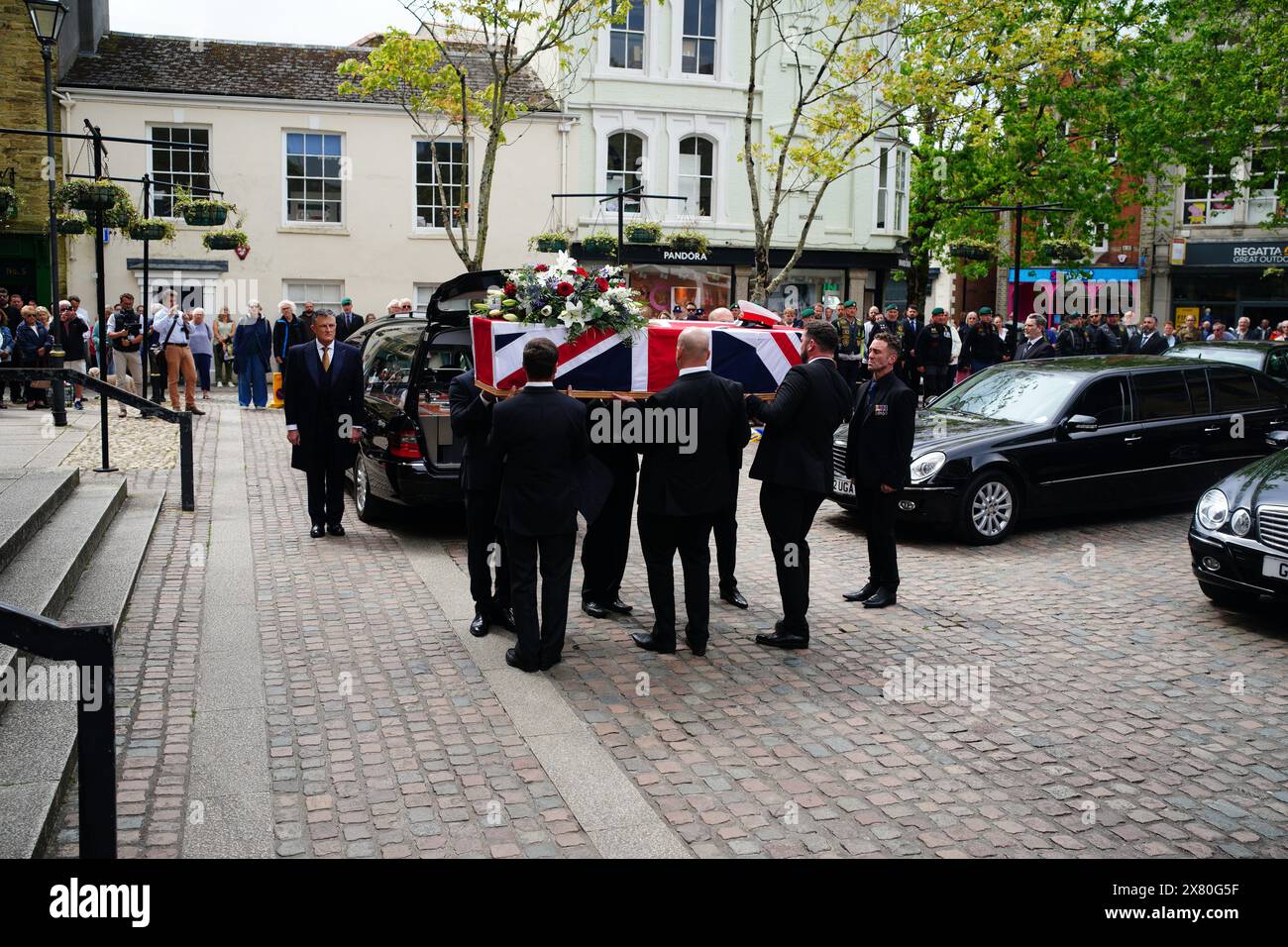 The coffin of aid worker James Henderson, who was among seven World ...