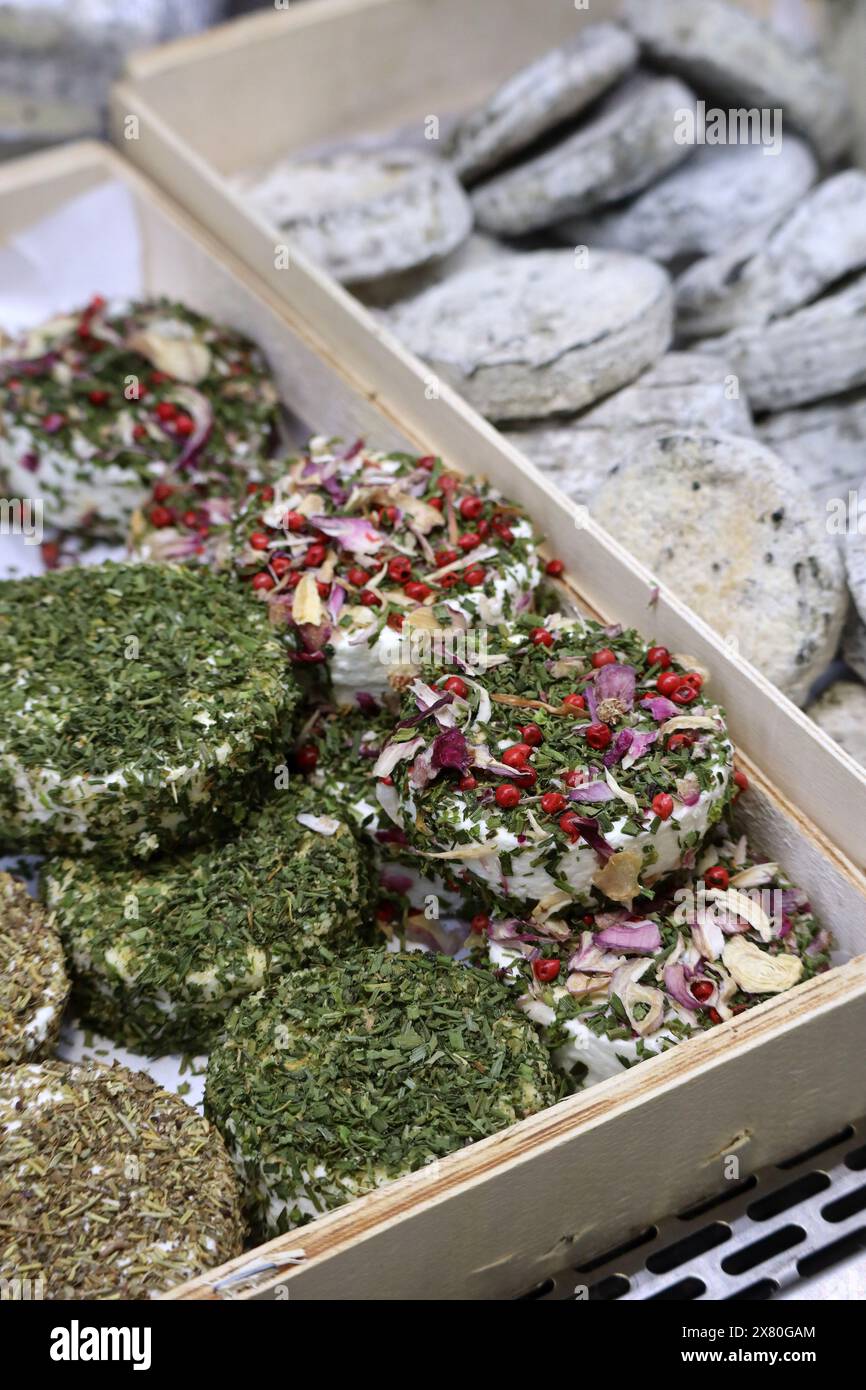 Close-up of goat cheese breaded with spices and herbs Stock Photo - Alamy