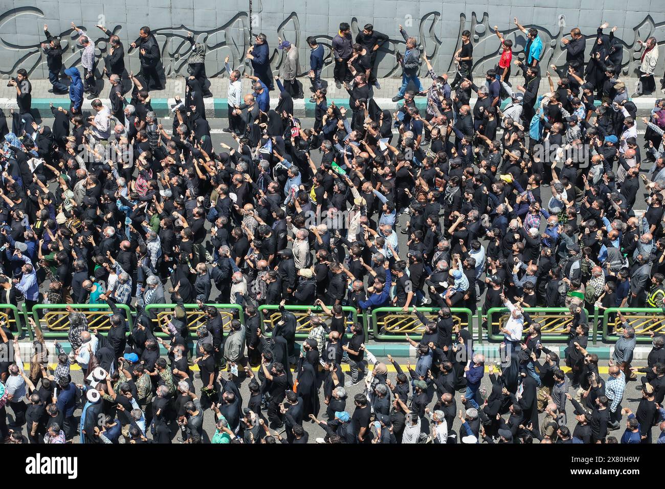 Tehran, Iran. 22nd May, 2024. Mourners gather in Islamic Revolution ...