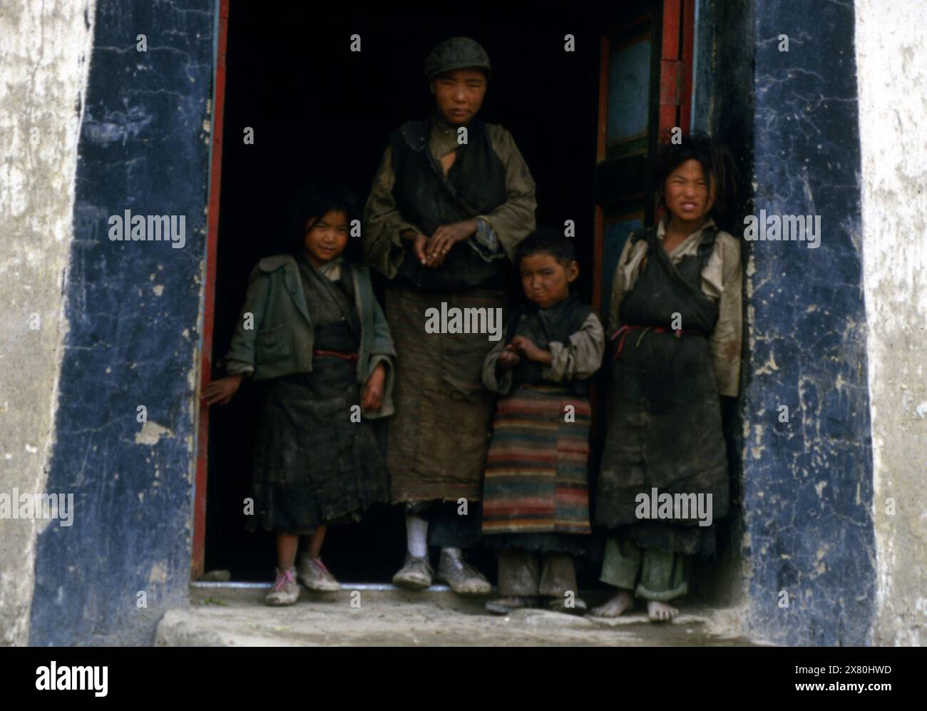 Family in doorway - Abject poverty in village on way from Lhasa to ...