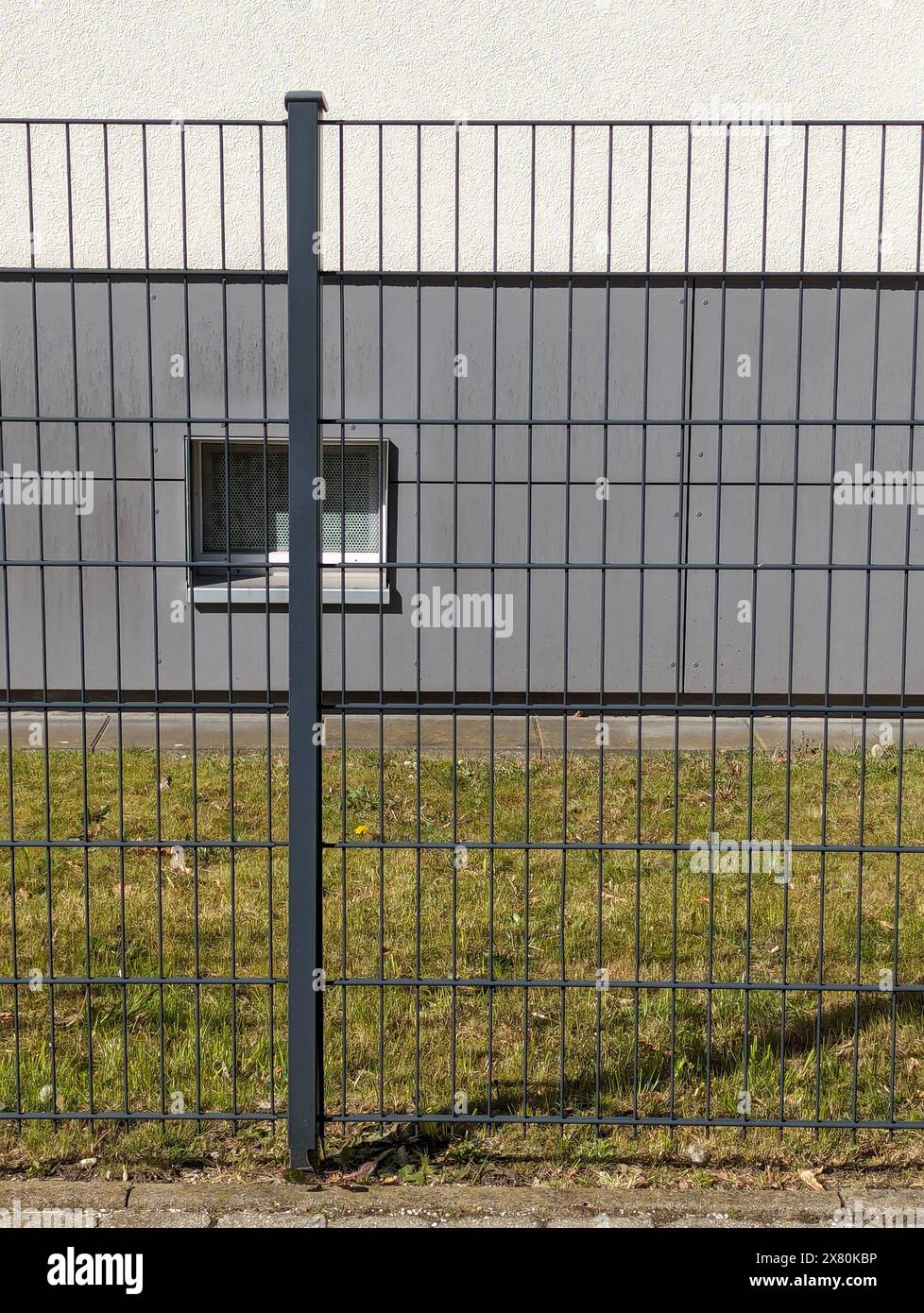 Window behind fence Stock Photo - Alamy