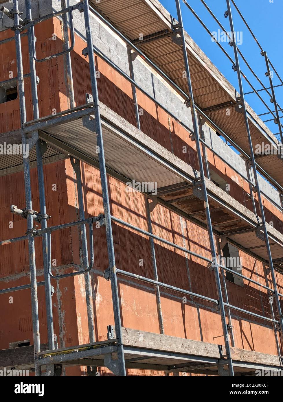 Scaffold on construction site Stock Photo - Alamy