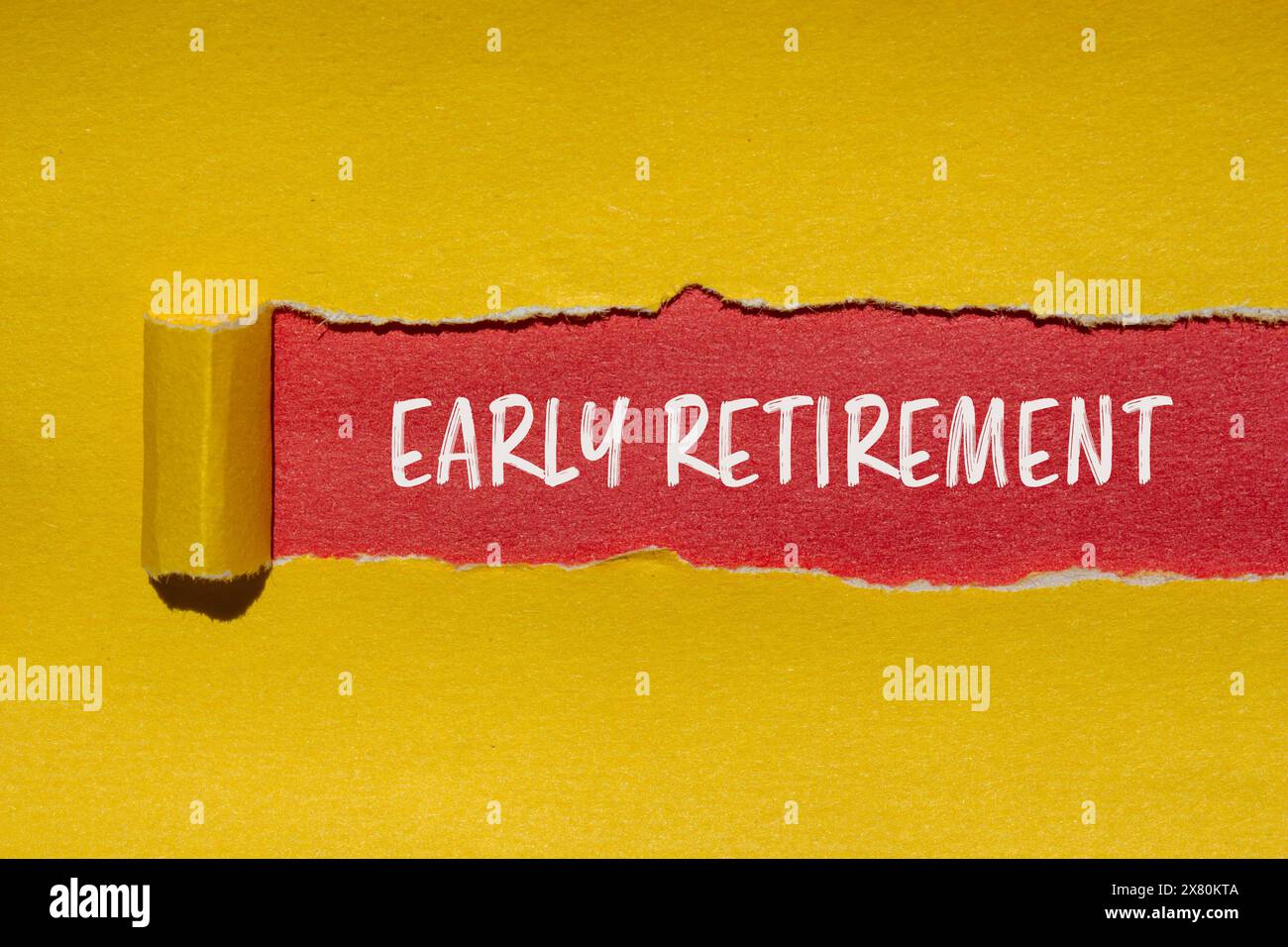 Early retirement words written on ripped yellow paper with red ...