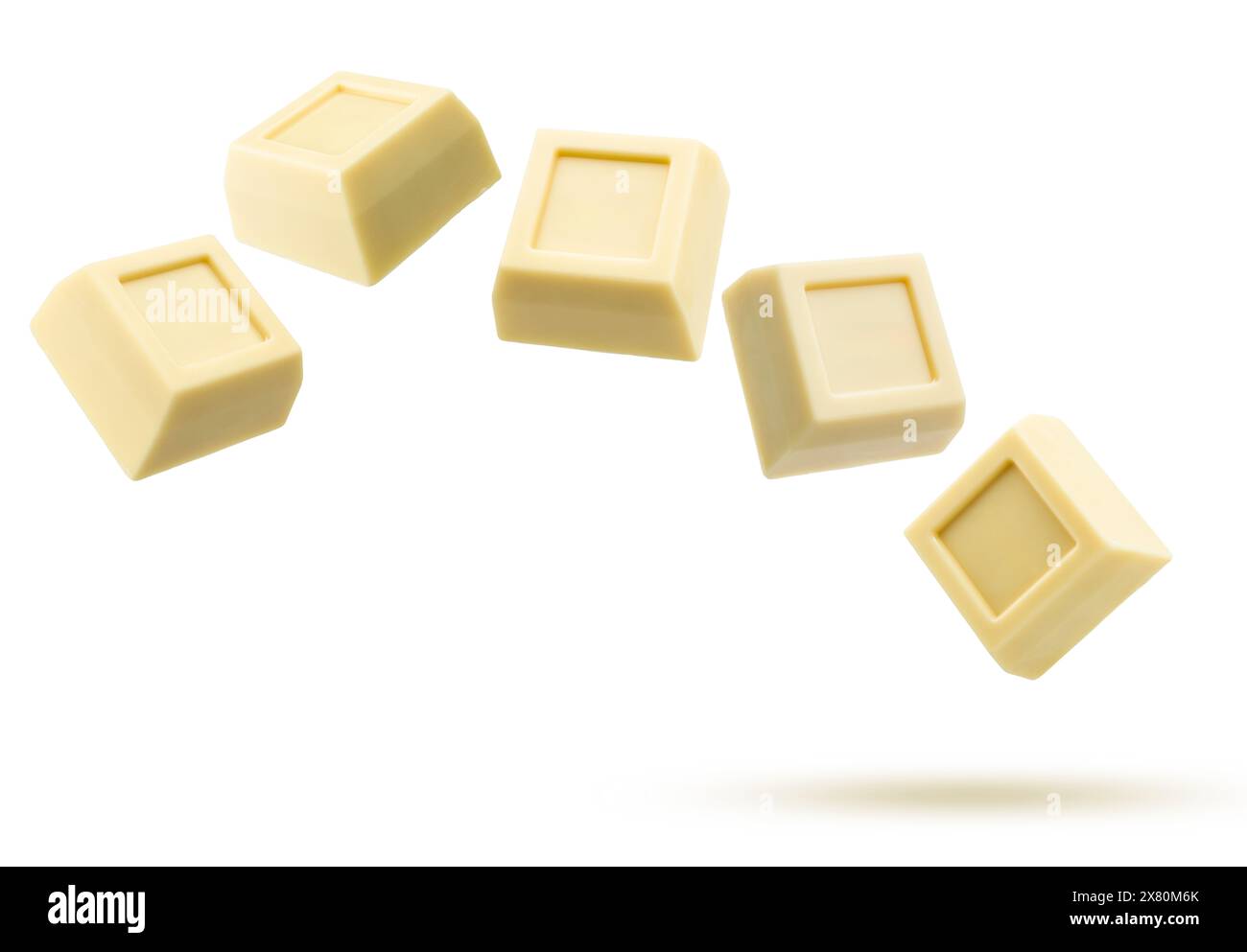 White chocolate blocks falling on white background Stock Photo - Alamy