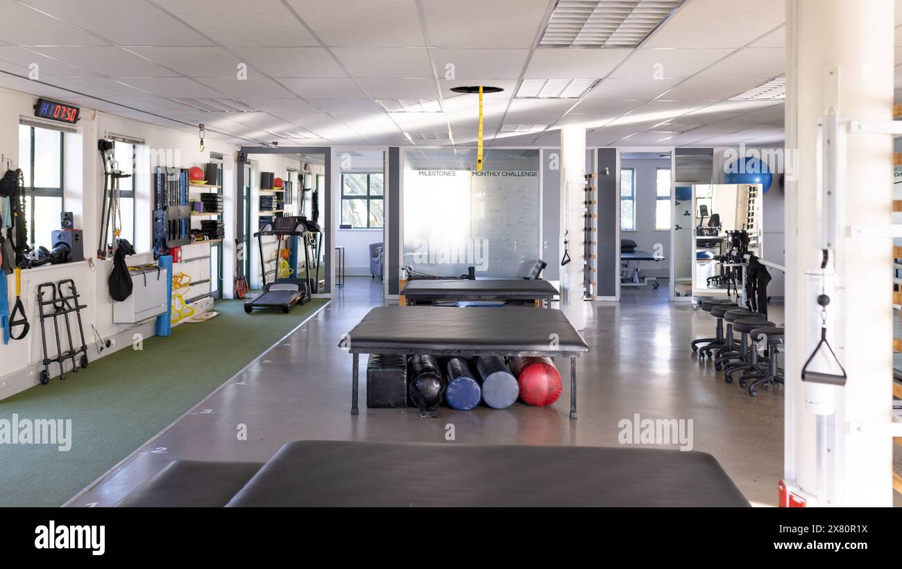 Gym rehabilitation center with various exercise equipment Stock Photo ...